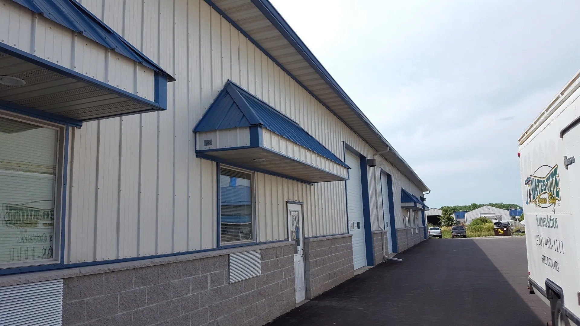 Blue 6 inch Gutter and White 3x4 Downspout