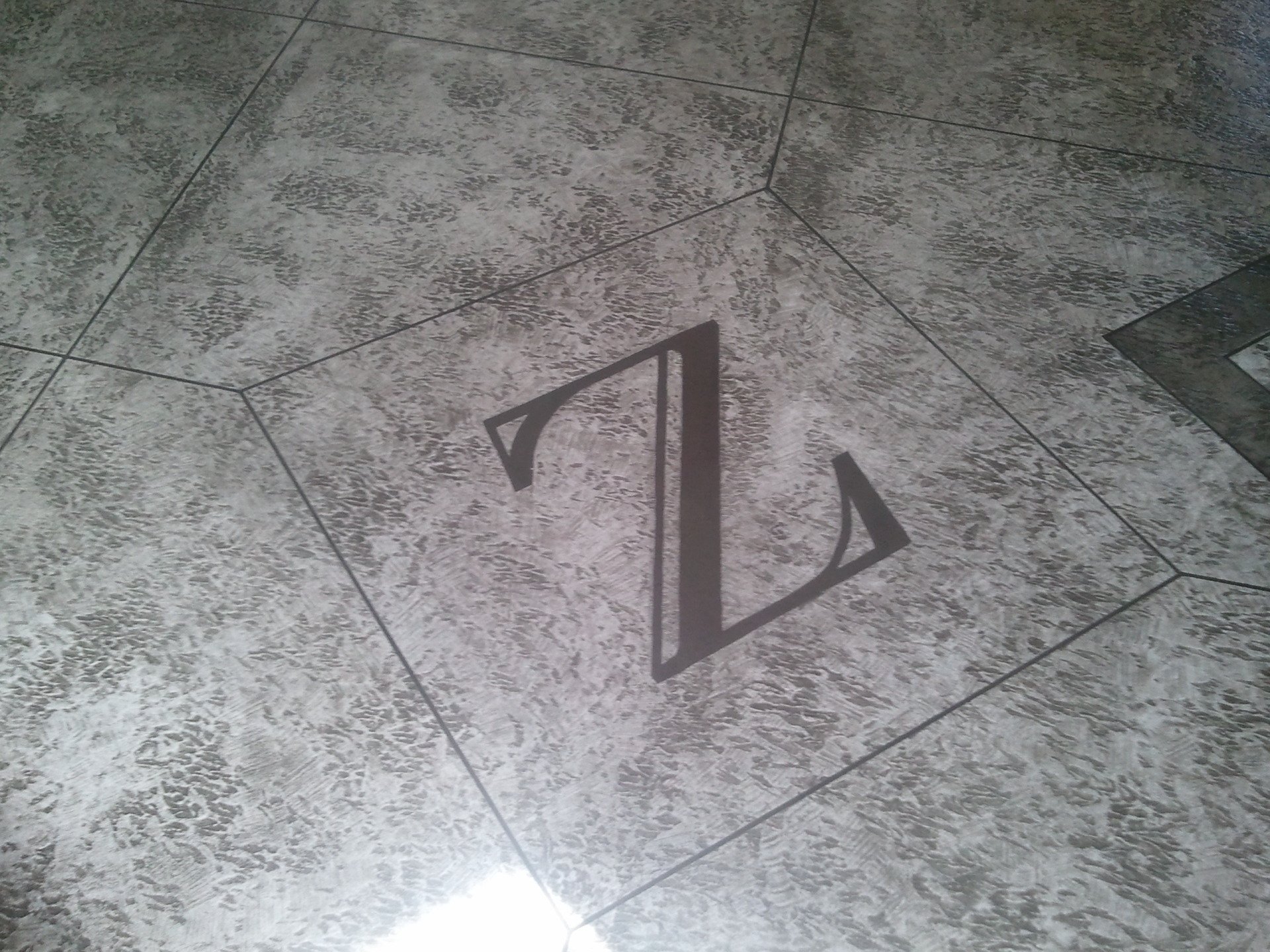 Logos and Inlays | Custom Concrete | Prairie City, IA